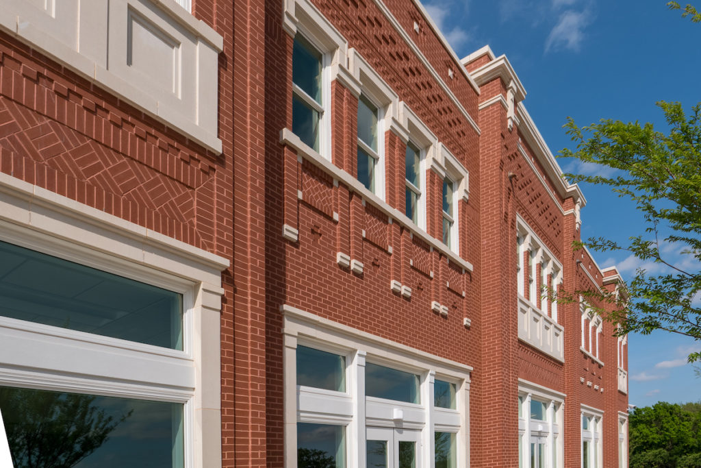 Detailed Design Work in Brick Highlighted by Cast Stone | Advanced ...